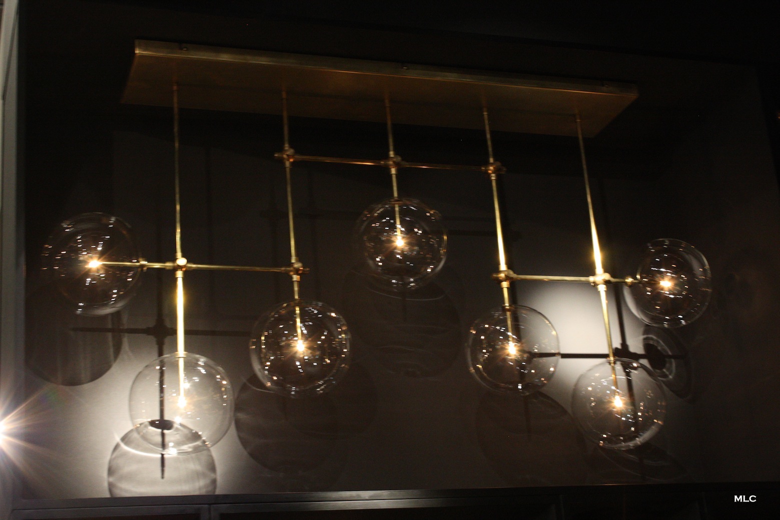 Joli luminaire design et poétique en verre et métal